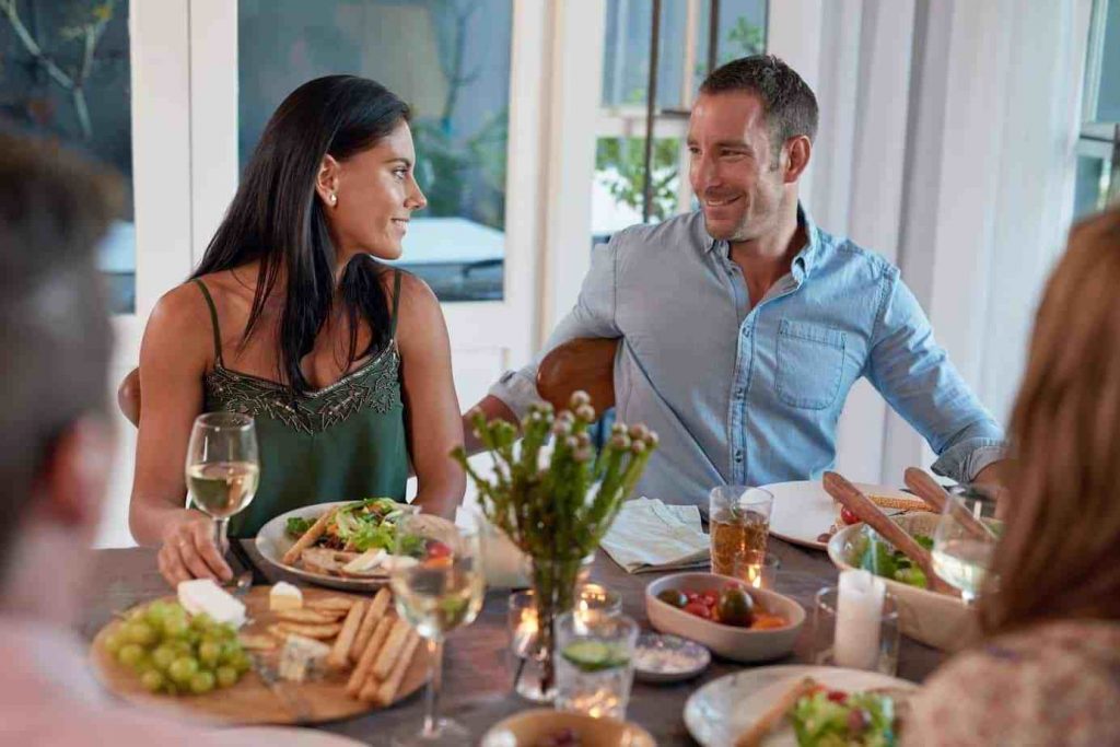 Couple enjoying dinner cooked by personal chef from Table at Home ...